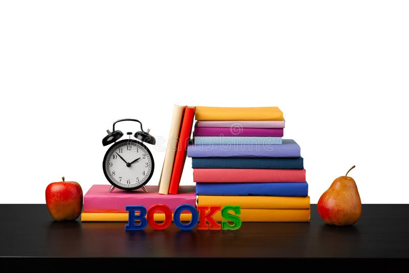 Stack of Books and Alarm Clock, Time To Read Concept Stock Photo ...
