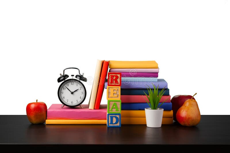Stack of Books and Alarm Clock, Time To Read Concept Stock Photo ...