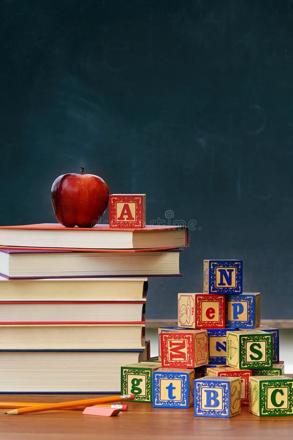 Stack of Books with Apple and Wooden Blocks Stock Photo - Image of math ...