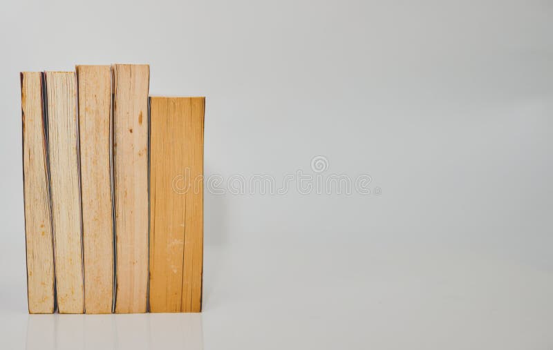Stack of Books Arranged Horizontally on White Background with Glasses ...