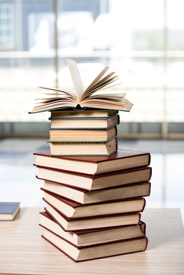 The Stack of Books Arranged the Office Desk Stock Photo - Image of ...