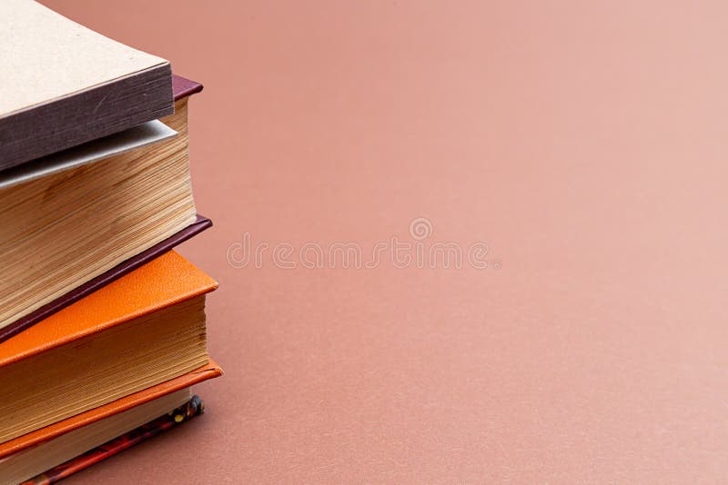 Stack of Books on a Beige Background. Stock Image - Image of ancient ...