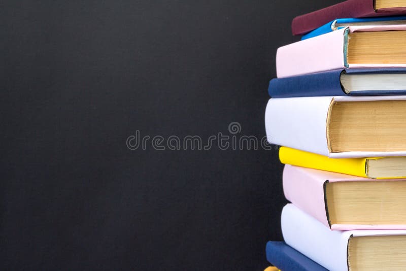 Stack of Books on Black Background Stock Image - Image of black ...
