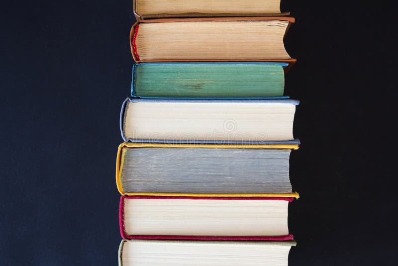 Stack of Books on Black Background Stock Photo - Image of bookshelf ...