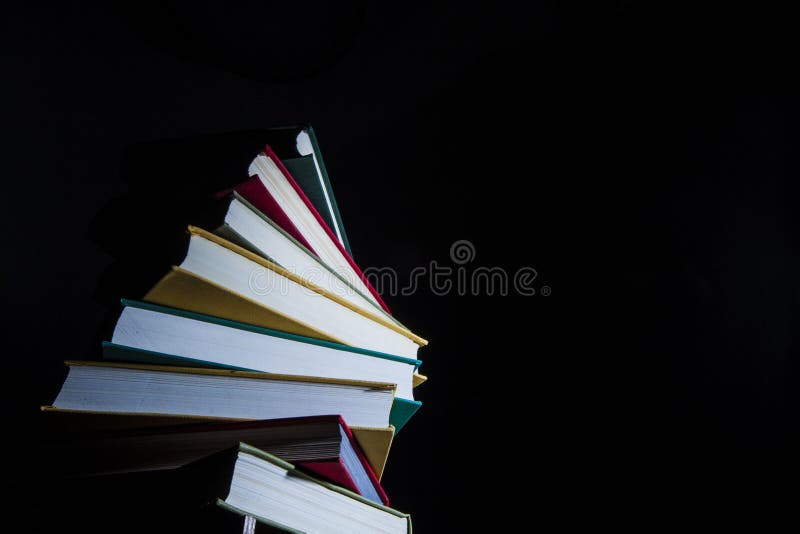 Stack of Books on Black Background Stock Photo - Image of black ...