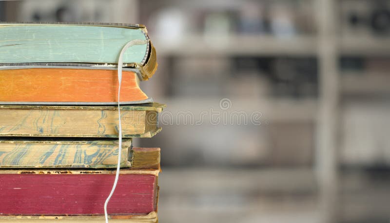 Stack of Books with Blurred Bookshelf Background, Reading, Learning ...