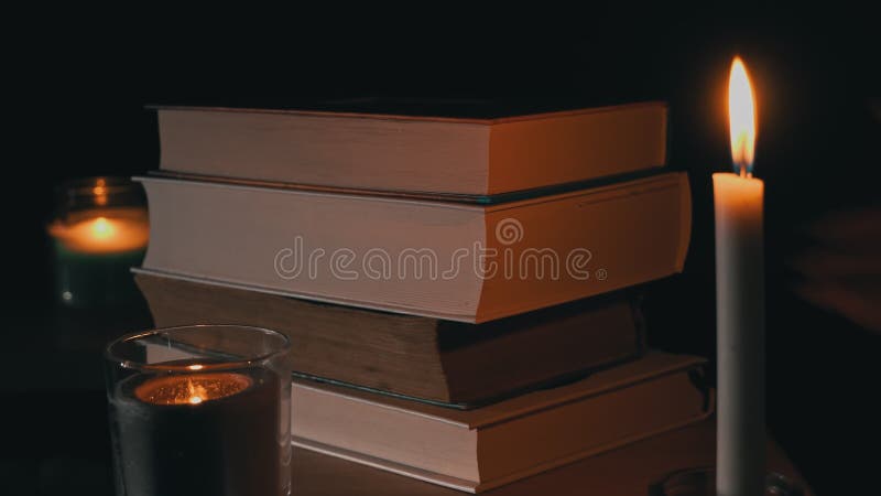Stack of Books by Candlelight, a Selection of Literature for Reading at ...