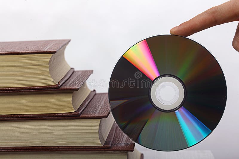 Stack of books and CD-ROM stock image. Image of reading - 50122269