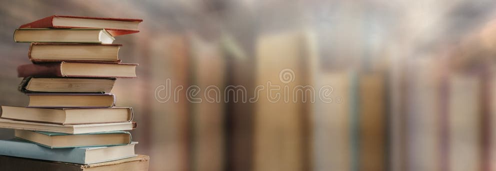 Stack of Books in the Colored Cover Lay on the Wood Table with Brick ...