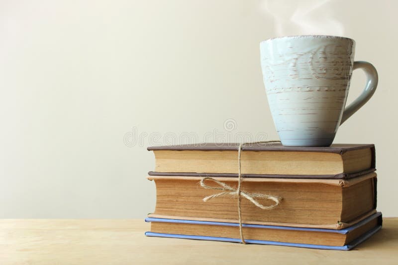 Stack of Books and a Cup of Tea Stock Photo - Image of pile, textbook ...