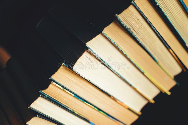 Stack of Books on a Dark Background Stock Photo - Image of classic ...