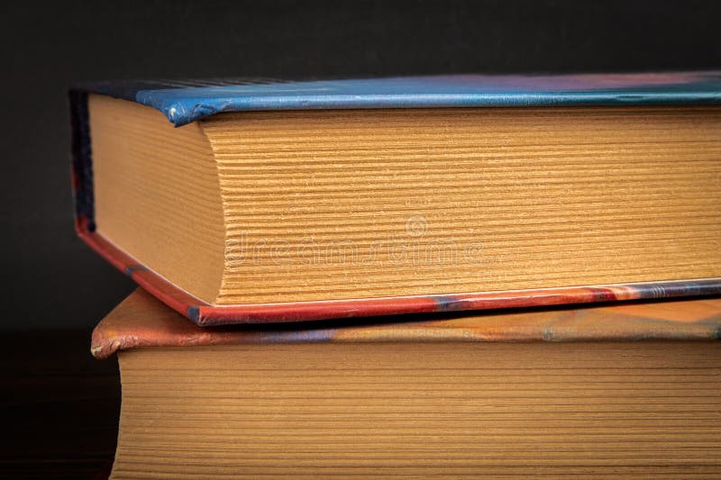 Stack of Books on a Dark Background. Skills and Education Stock Photo ...