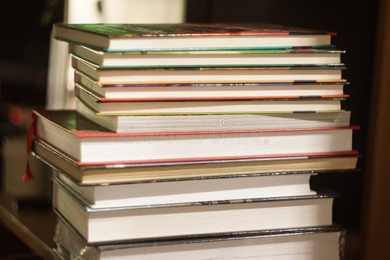 A Stack of Books on a Dark Background Stock Photo - Image of dark ...