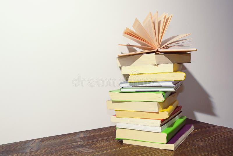 Stack of Books on Dark Rustic Table. Copy Space Stock Image - Image of ...