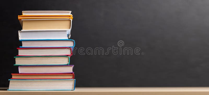 Stack of Books on Desk with Chalkboard Stock Image - Image of ...