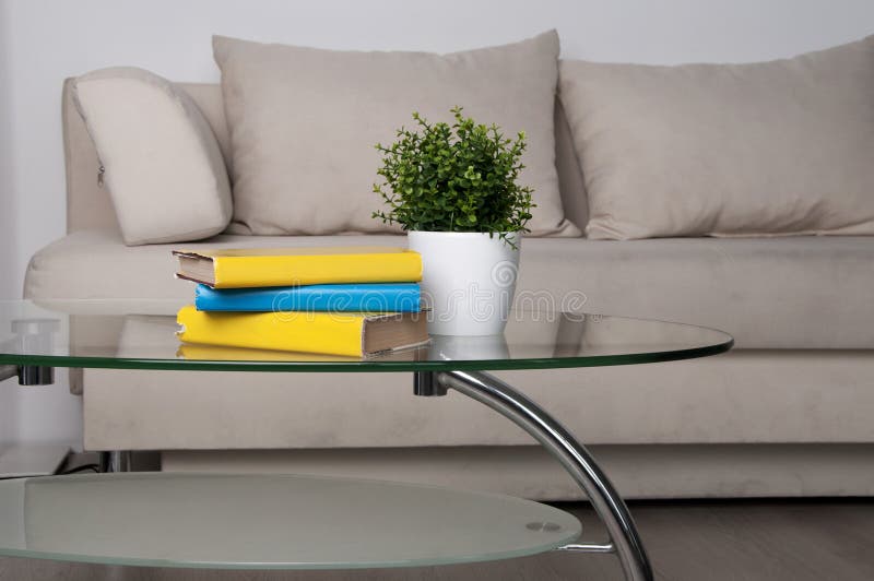 Stack Books on Glass Table.Interior Living Room with a Glass Ta Stock ...