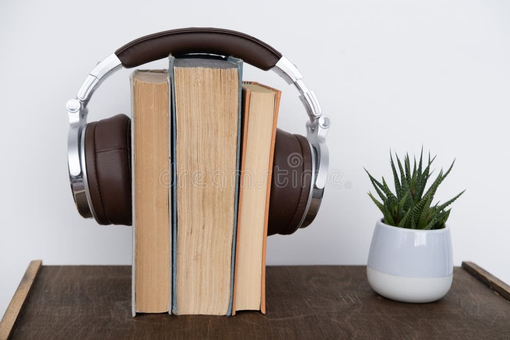 Stack of Books with Headphones, Learning Foreign Languages Using ...