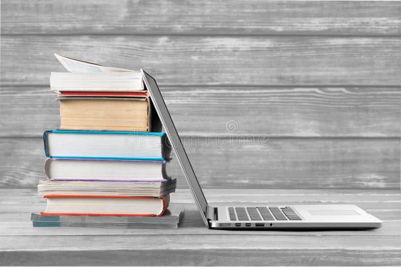 Stack of Laptop Computers. a Pile of Computers on a Bright Table ...