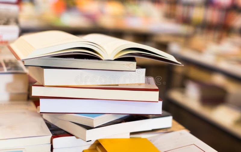 Stack of Books Lying on Table in Bookstore Stock Image - Image of ...