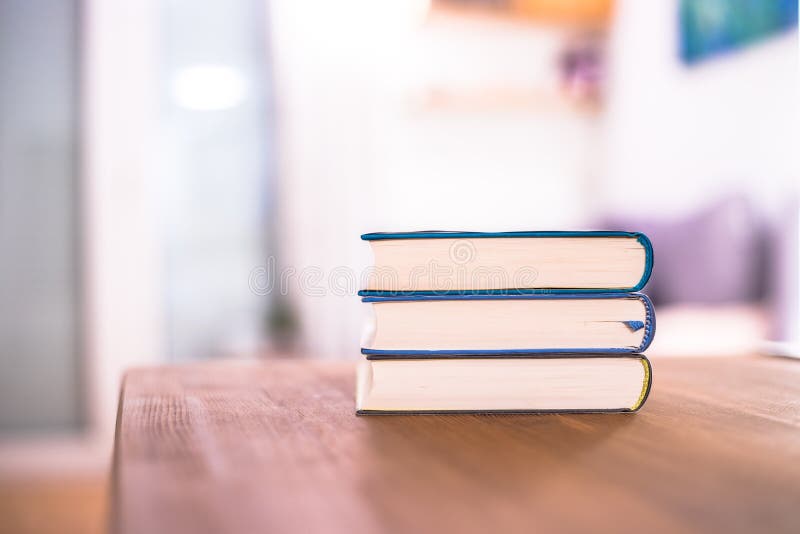 Knowledge and Science Concept: Stack of Books Lying on Wooden Desk ...