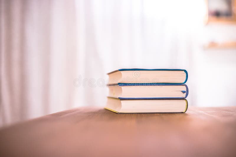 Knowledge and Science Concept: Stack of Books Lying on Wooden Desk ...