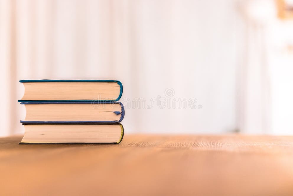 Knowledge and Science Concept: Stack of Books Lying on Wooden Desk ...