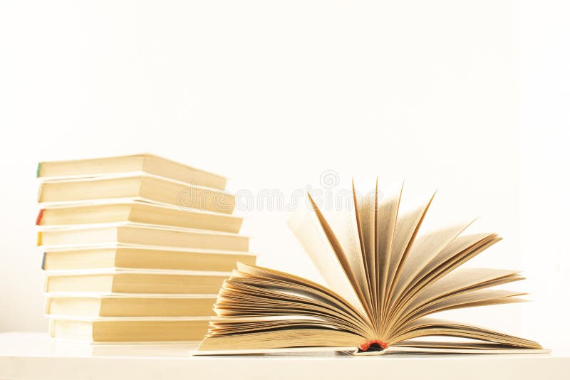 A Stack of Books and an Open Book. Books Background for Science and ...