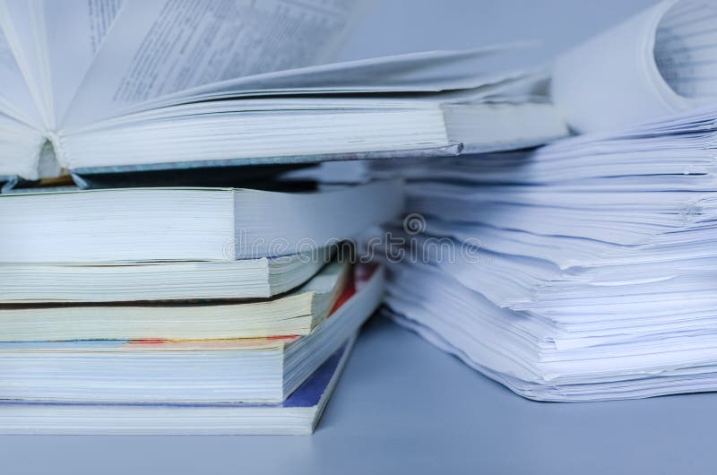 Stack of Books and Stack of Paper Stock Image - Image of book, storage ...