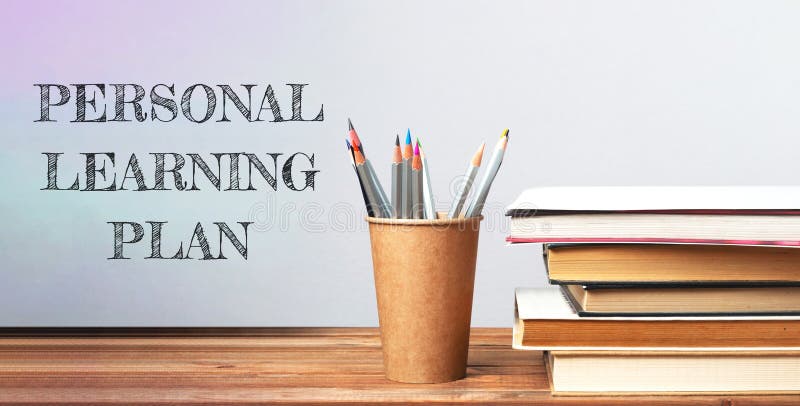 A Stack of Books and a Pencil Holder Stock Photo - Image of poster ...