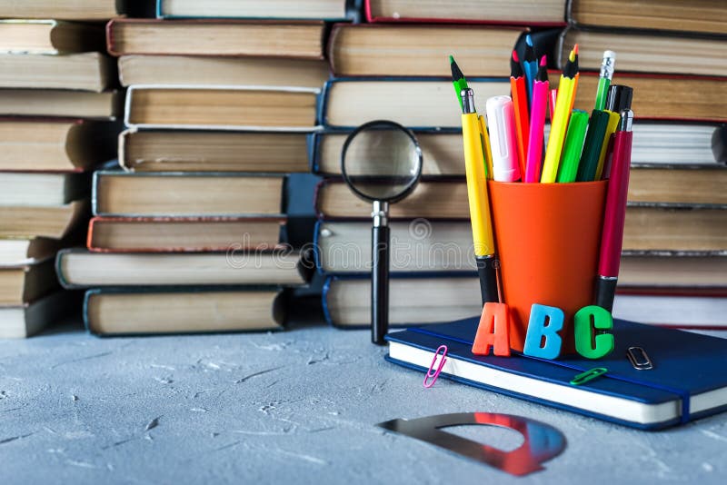 A Stack of Books and Pencils on a Desk in Elementary School. a Stack of ...
