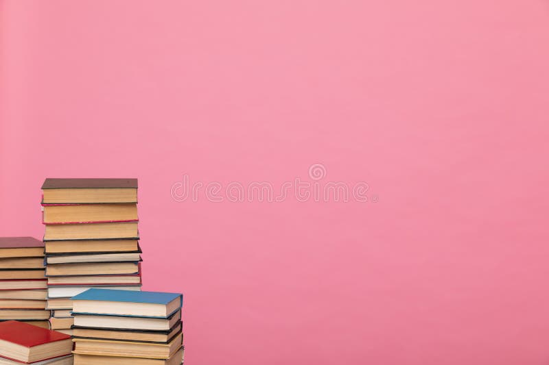 Stack of Books on a Pink Background in the Learning Library Stock Image ...