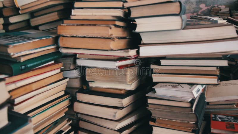 Pile Of Books Scattered On The Floor In The Library Stock Footage ...