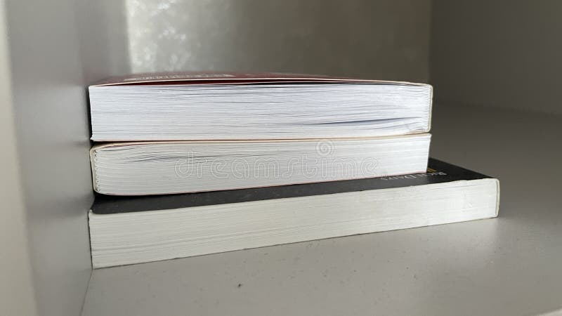 Stack of Books on the Shelf in the Library. Close-up Stock Image ...
