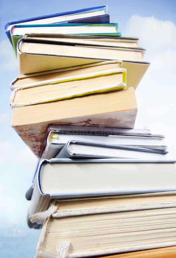 Stack of books and sky stock photo. Image of reading - 43589012