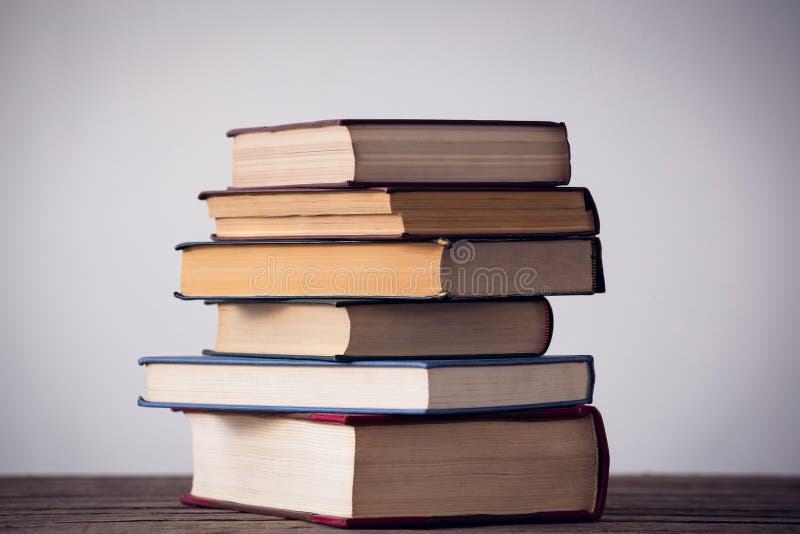 Stack of books on table stock image. Image of shape, structure - 98002571