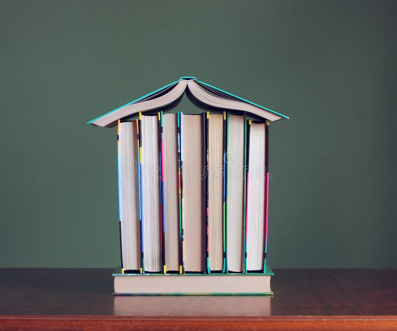 Stack of Books on the Table in the Form of a Building. Back To School ...