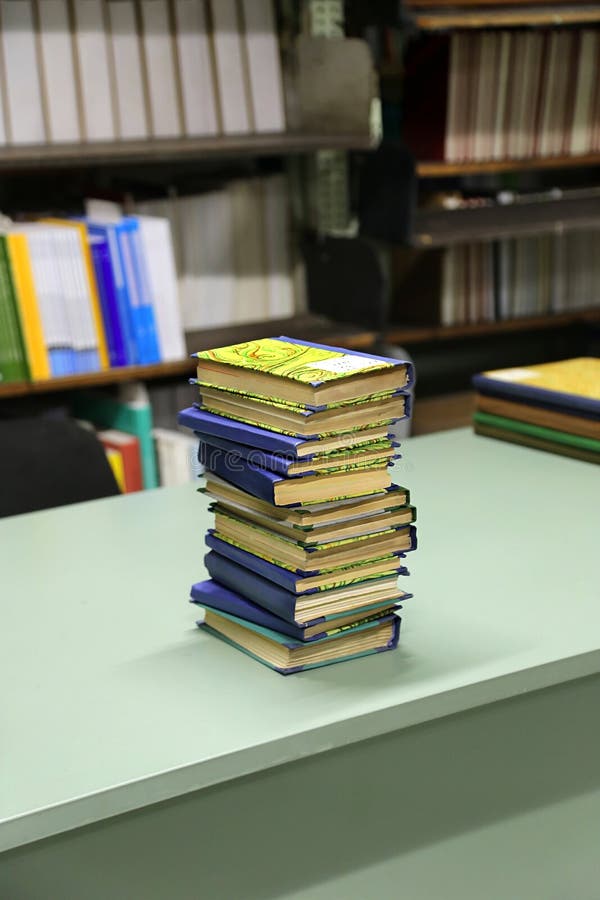 Stack of Books on the Table Stock Photo - Image of cabinet, bookstore ...