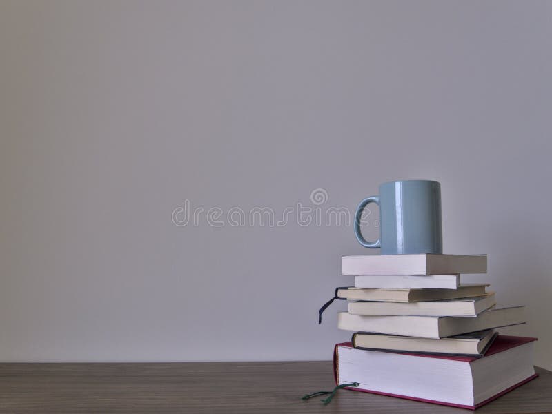 Stack of Books on a Table with Light Colored Background.Education ...