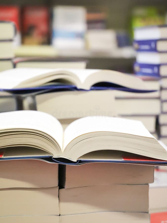 Stack of Books on the Table. Open Book. Back To School Concept Stock ...