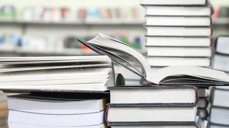 Stack of Books on the Table. Open Book. Back To School Concept Stock ...