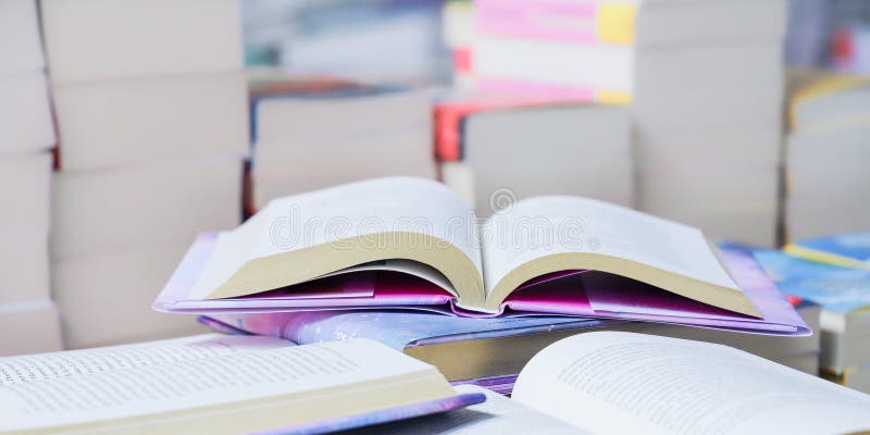 Stack of Books on the Table. Open Book. Back To School Concept Stock ...