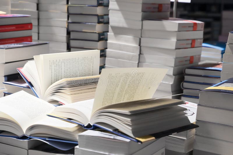 Stack of Books on the Table. Open Book. Back To School Concept Stock ...