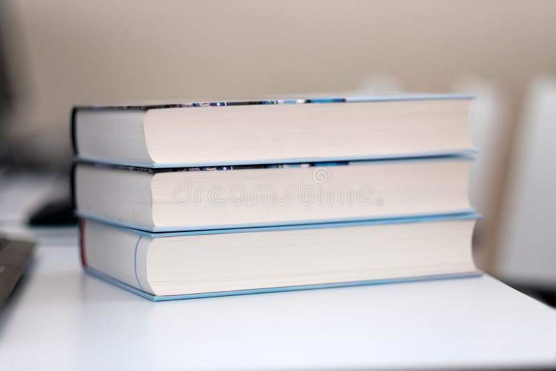 Stack of books on a table stock photo. Image of clever - 149388704