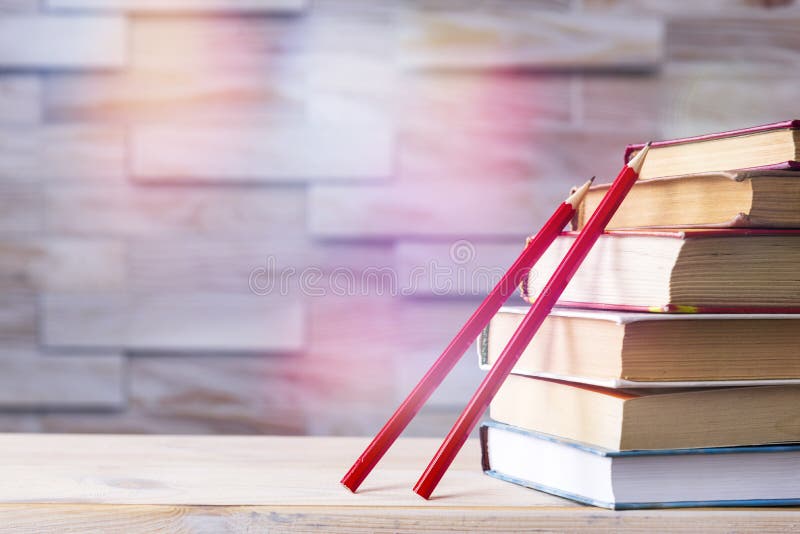 Stack of Books and Two Red Wooden Pencils on Wooden Background, Back To ...