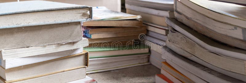 A Stack of Books in a Variety of Colors and Sizes with Different Covers ...