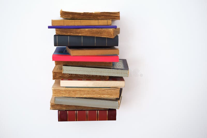 Stack of Books on the Wall stock image. Image of learn - 84838615