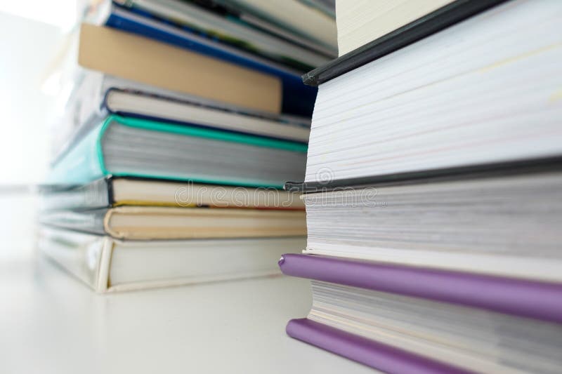 Stack of Books on White Surface Stock Image - Image of lovers ...