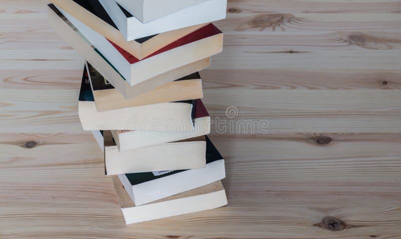 Knowledge and Science Concept: Stack of Books, Wooden Background Stock ...