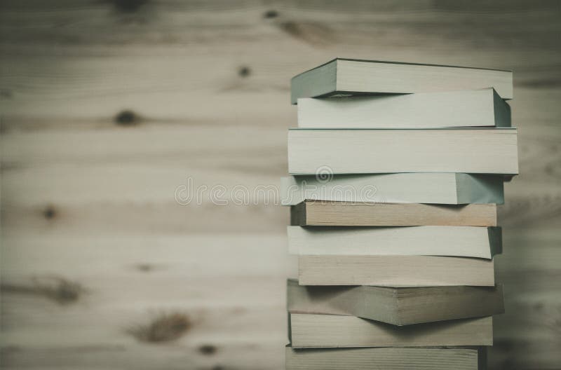 Knowledge and Science Concept: Stack of Books Lying on Wooden Desk ...