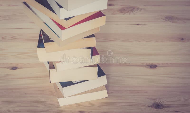 Knowledge and Science Concept: Stack of Books, Wooden Background Stock ...